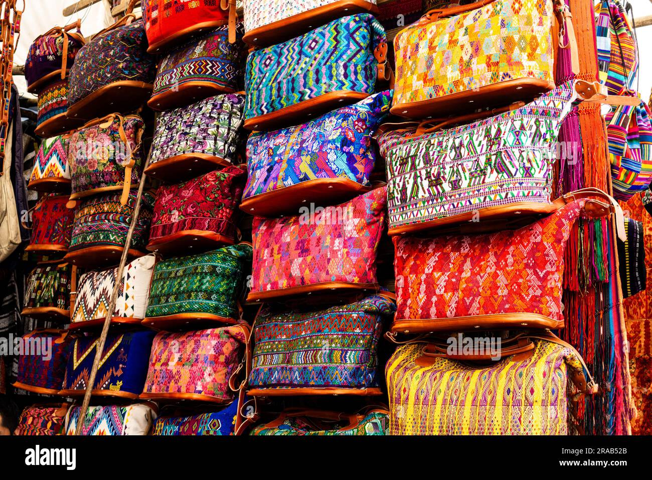 View of colorful indigenous maya bags with different patterns on market ...