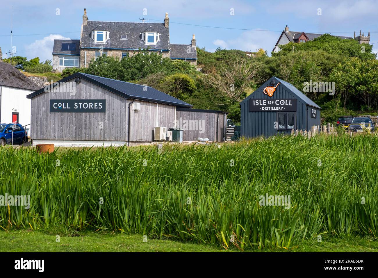 View of the Isle of Coll Distillery and Coll convenience store ...