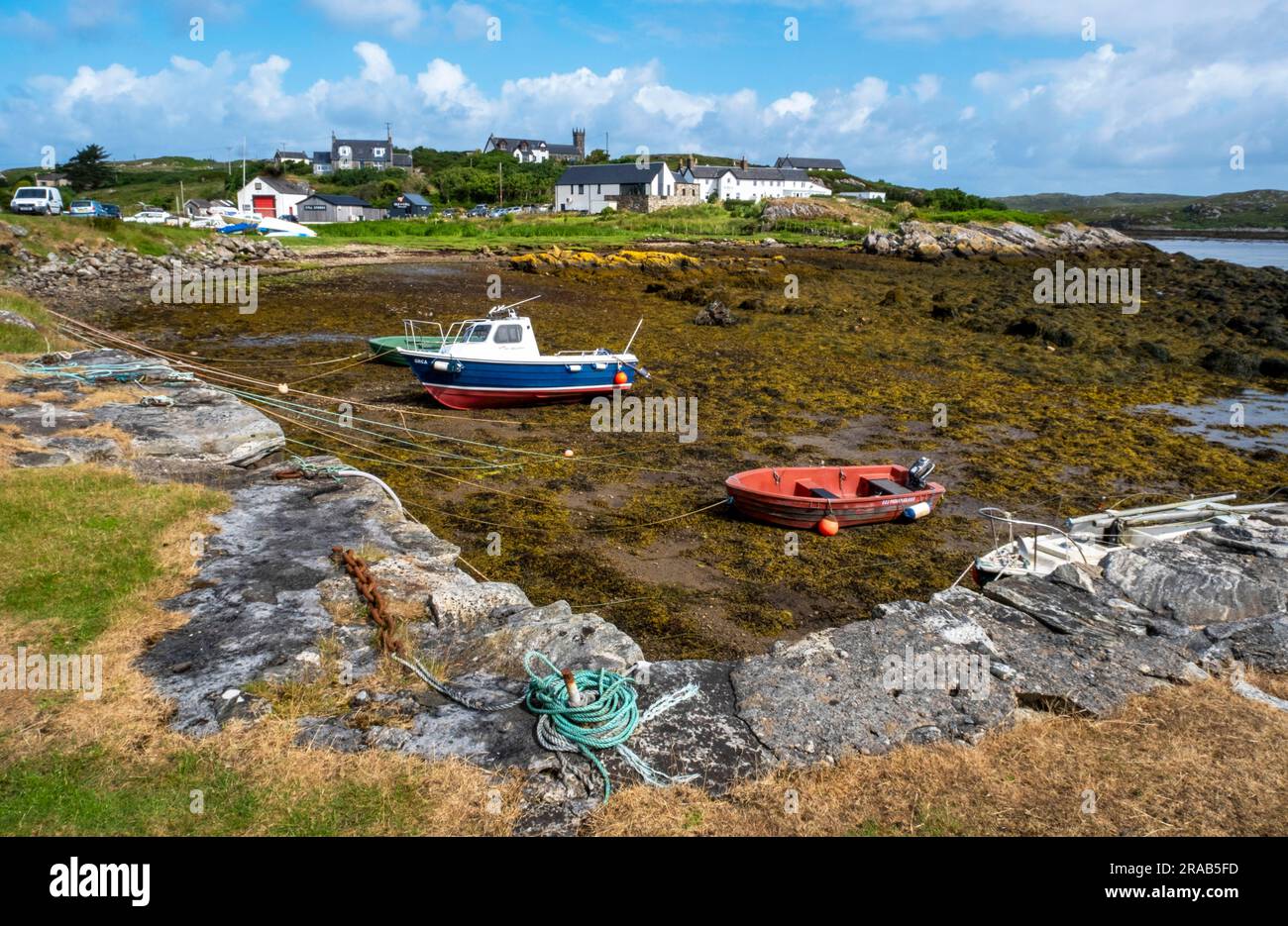 Boats at low tide in front of the Isle of Coll Hotel, Arinagour, Isle ...