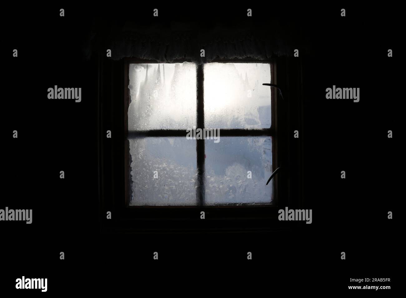 window frozen from the inside in norway of a hunting lodge Stock Photo ...