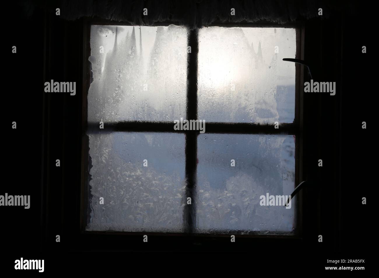 window frozen from the inside in norway of a hunting lodge Stock Photo ...