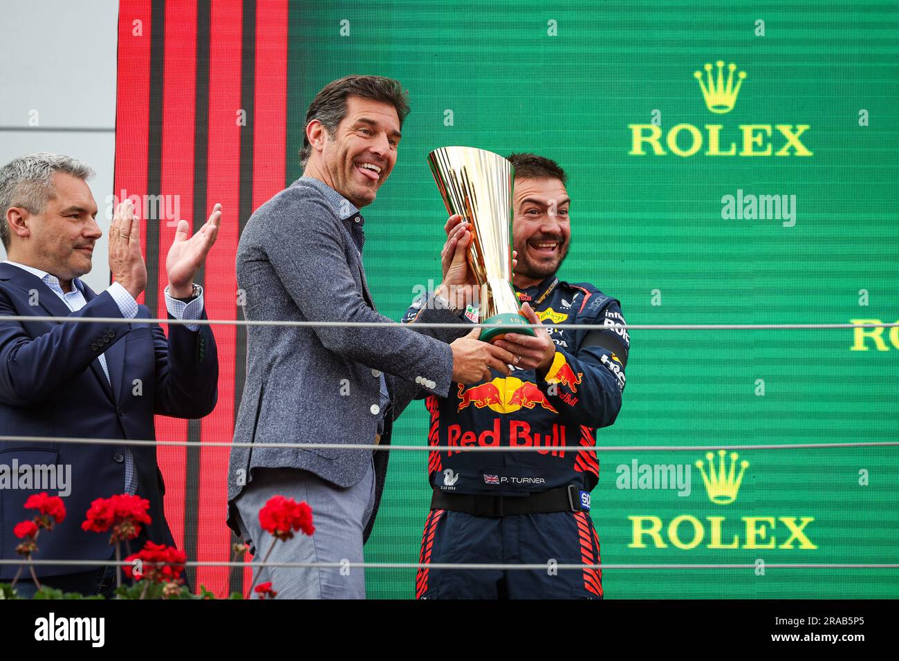 WEBBER Mark (aus), former F1 driver and TV presenter, on the podium ...