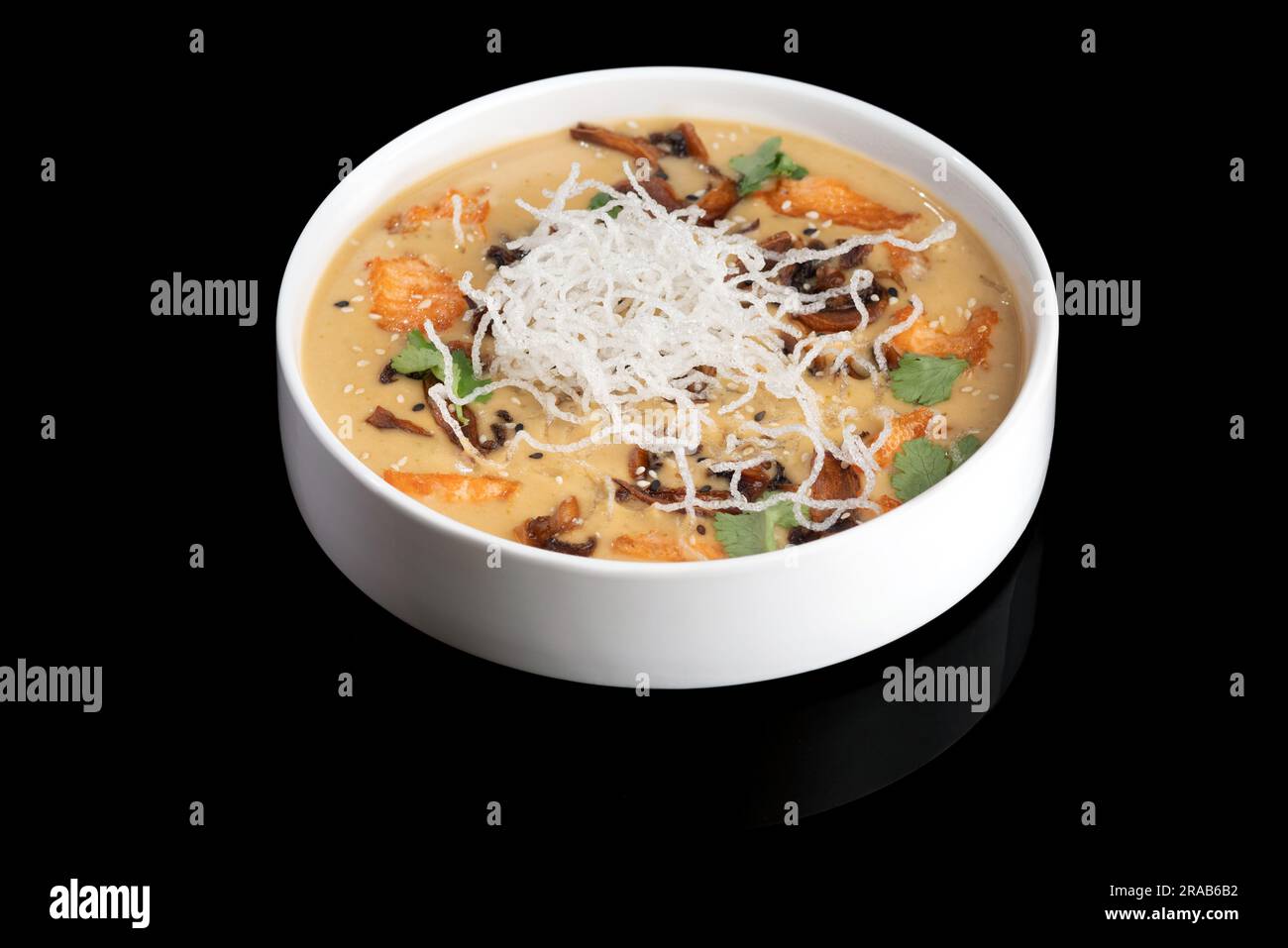 Spicy Thai soup Tom Yam with Coconut milk, Chili pepper and Seafood ...