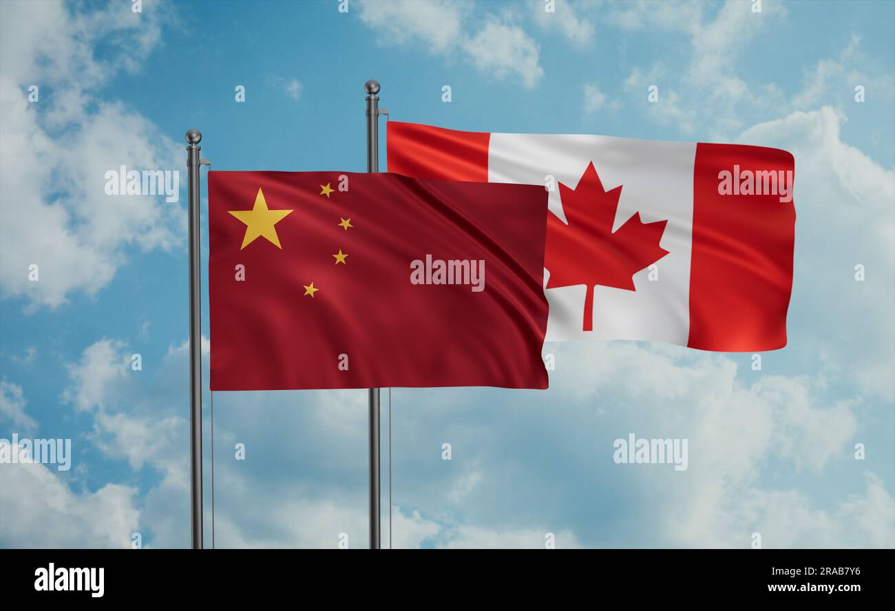 Canada and China flag waving together in the wind on blue sky, two ...
