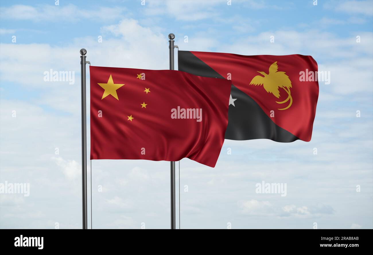 Papua New Guinea flag and China flag waving together on blue sky, two ...