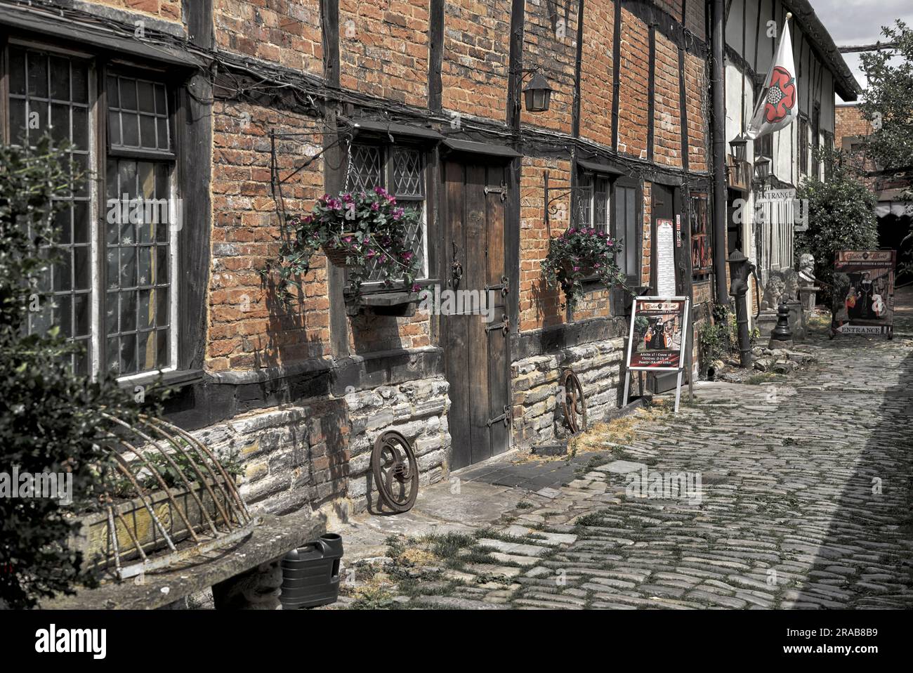Tudor World museum entrance with 16th century cobblestone alleyway and ...