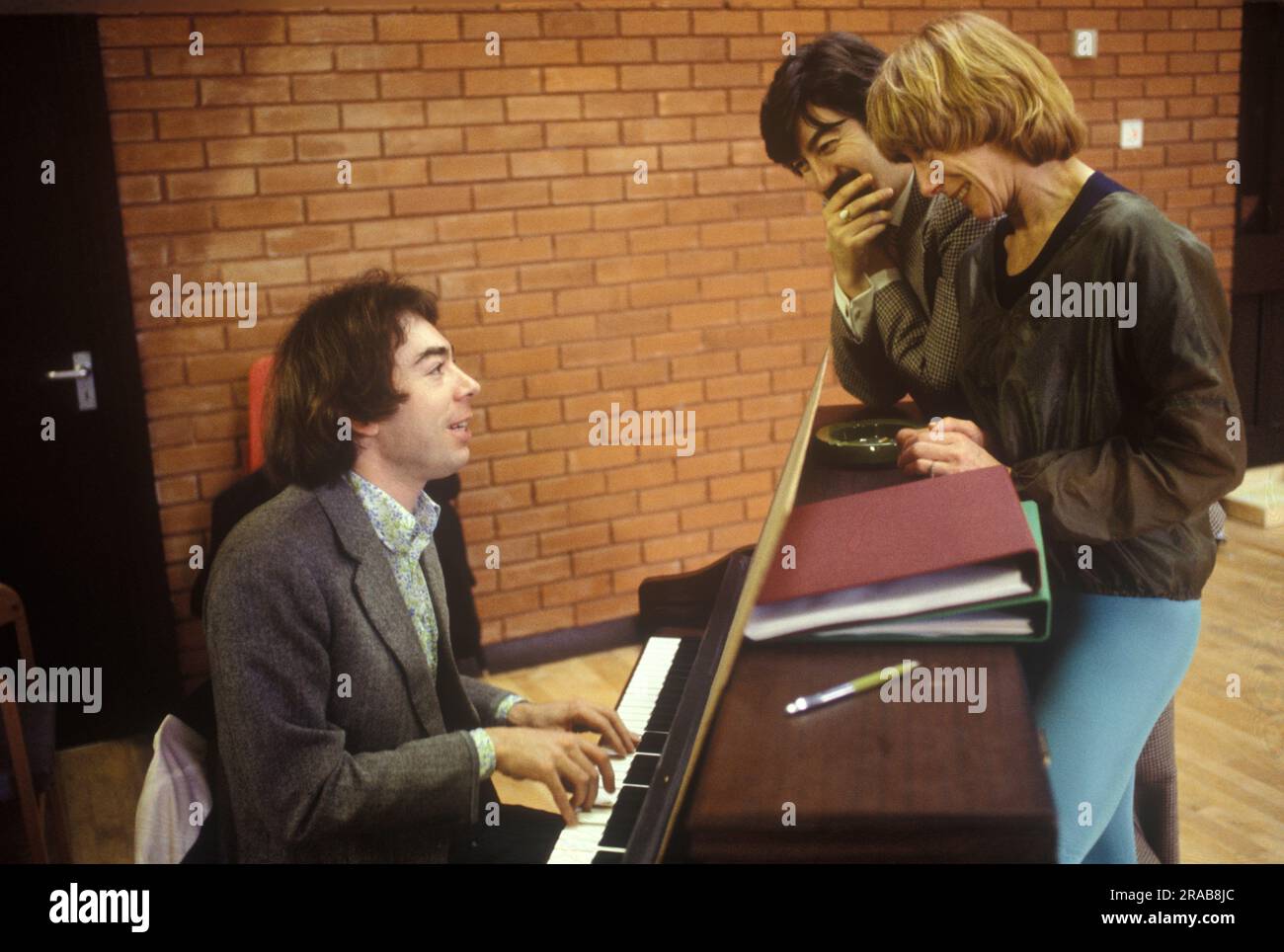 Andrew Lloyd Webber Cats the musical playing piano running through some ...