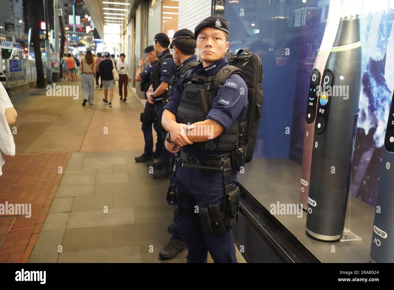 Hong Kong, China. 01st July, 2023. Police officers with full gear stand ...