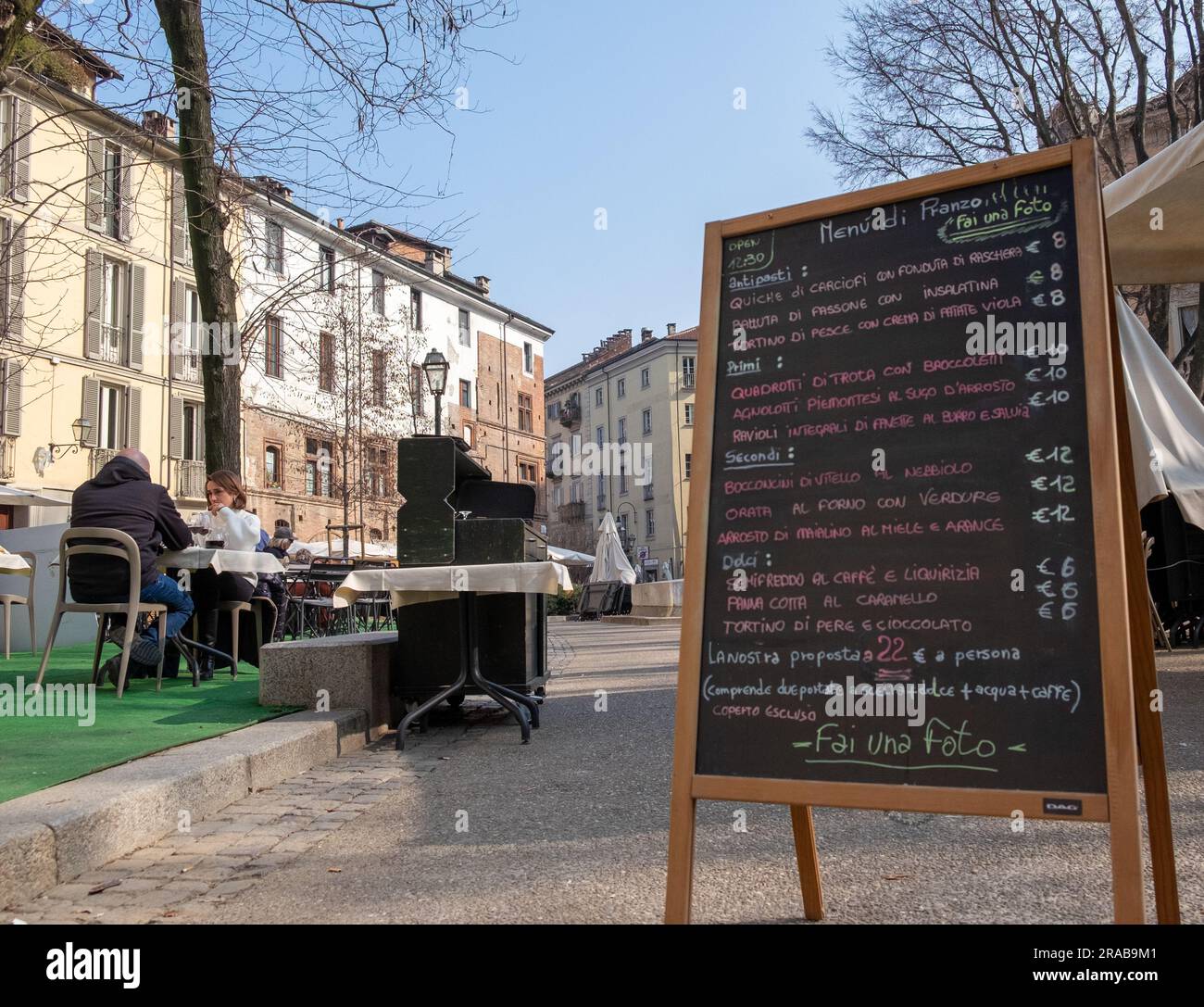 Restaurant and menu board in the Quadrilatero Romano, Turin, Italy ...