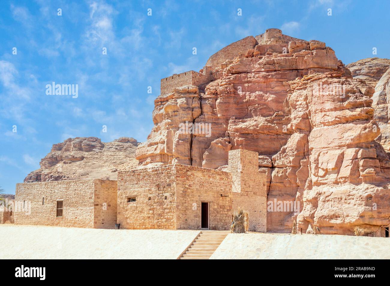 Al Ula old town street with castle walls on the hill, Medina province ...