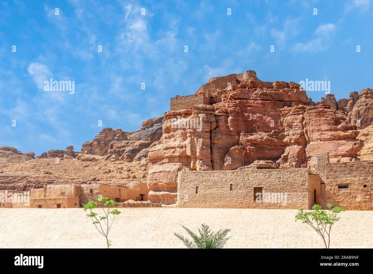 Al Ula old town street with castle walls on the hill, Medina province ...