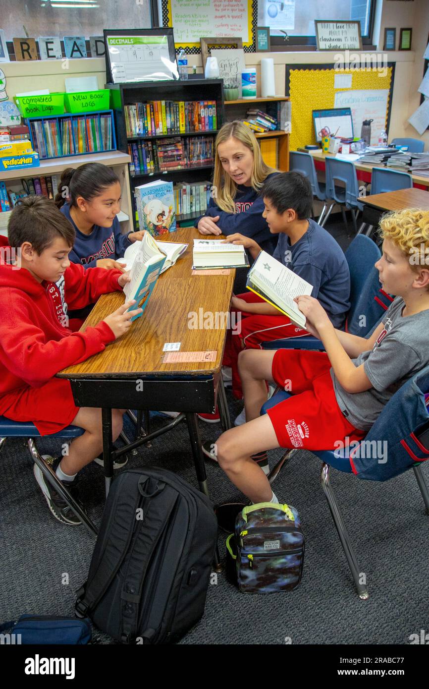 Middle School Students Reading Books