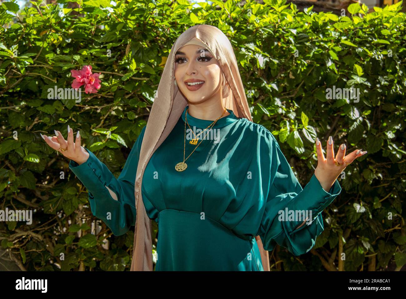 An Islamic professional model wearing the tradition hijab head dress ...