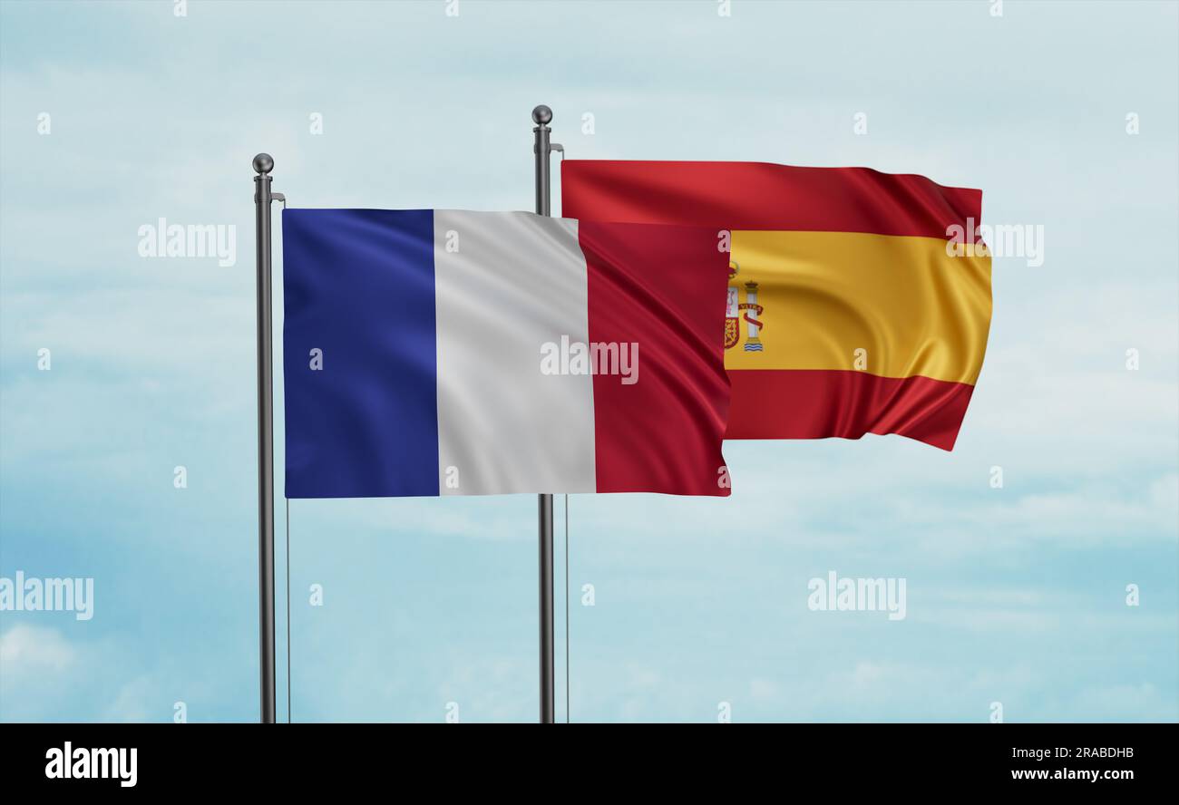 Spain and France flag waving together in the wind on blue sky, two ...