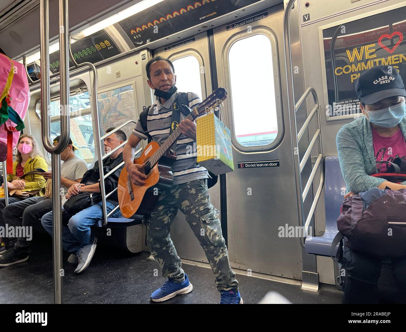 Singing playing for tips hi-res stock photography and images - Alamy