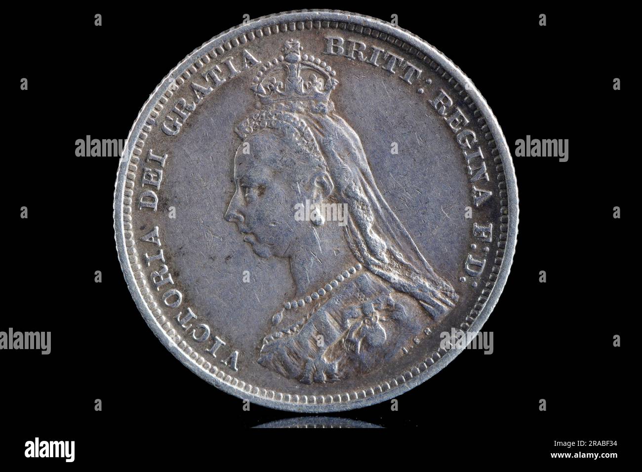 The obverse of an 1887 Silver shilling featuring Queen Victoria Stock ...