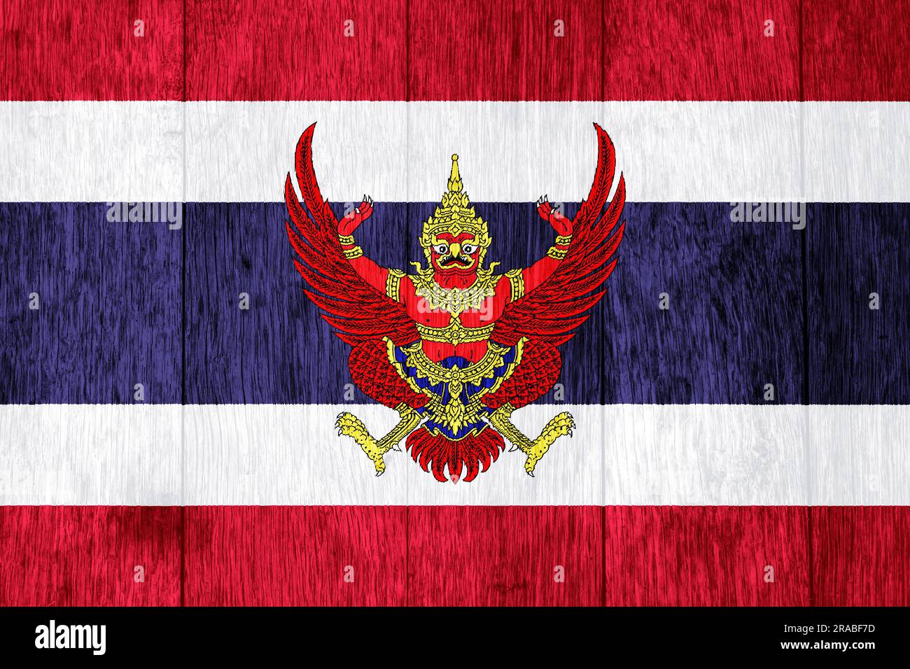 Flag and coat of arms of the Kingdom of Thailand on a textured ...
