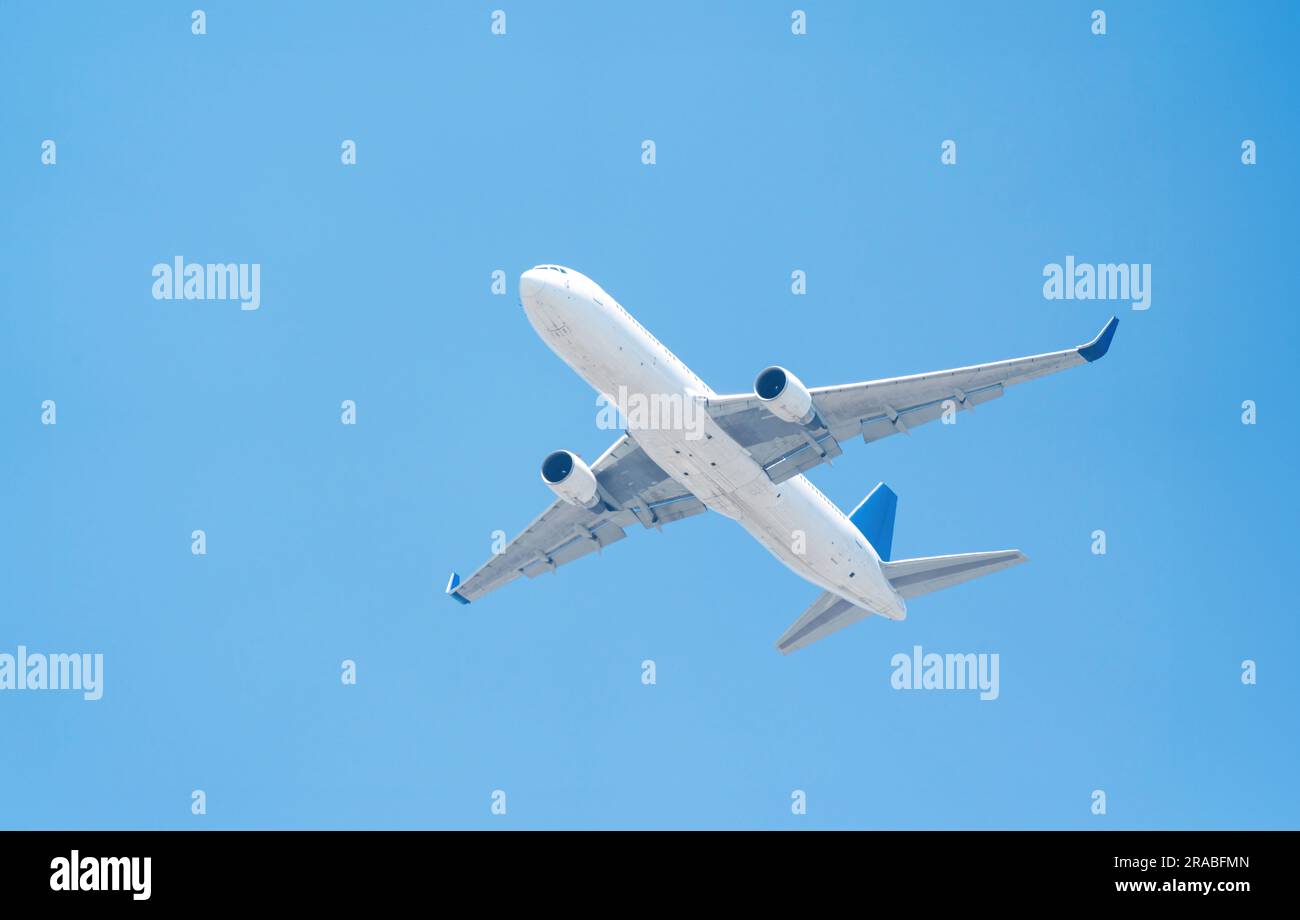 White passenger plane taking off in Turkey Stock Photo - Alamy