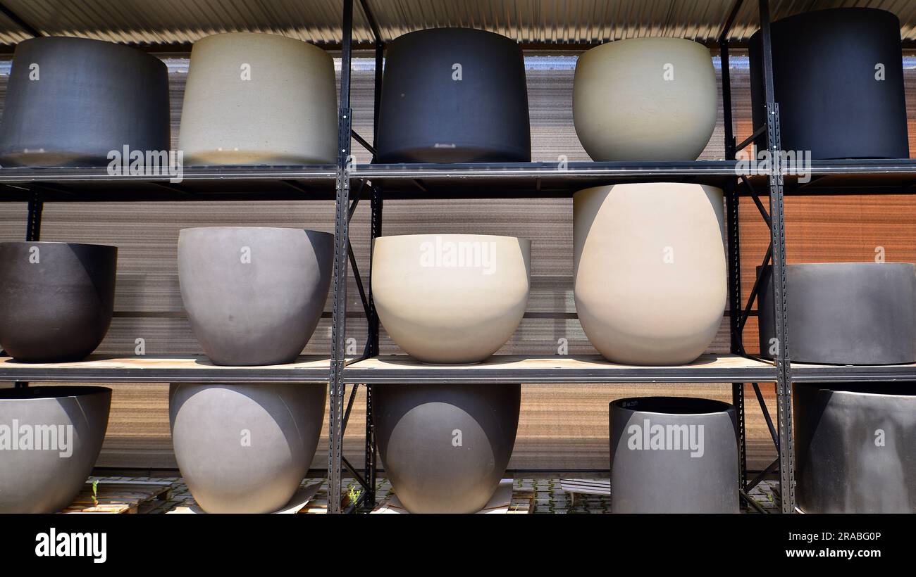 Very large plant pots in the shop Stock Photo - Alamy