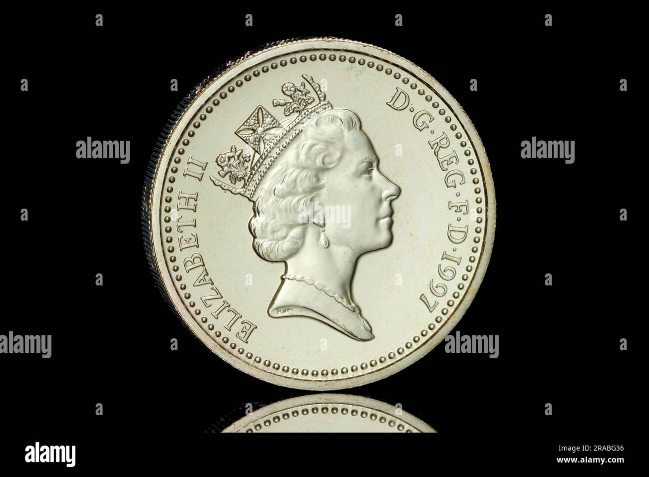 1997 £1 coin that is no longer in circulation in the UK. The obverse features the 3rd coin ...