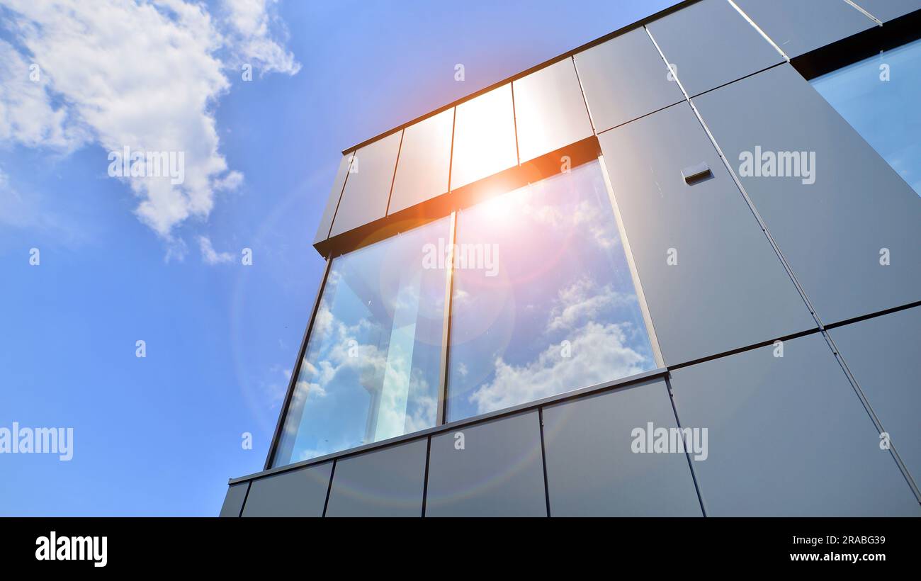 Graphite facade and large windows on a fragment of an office building ...