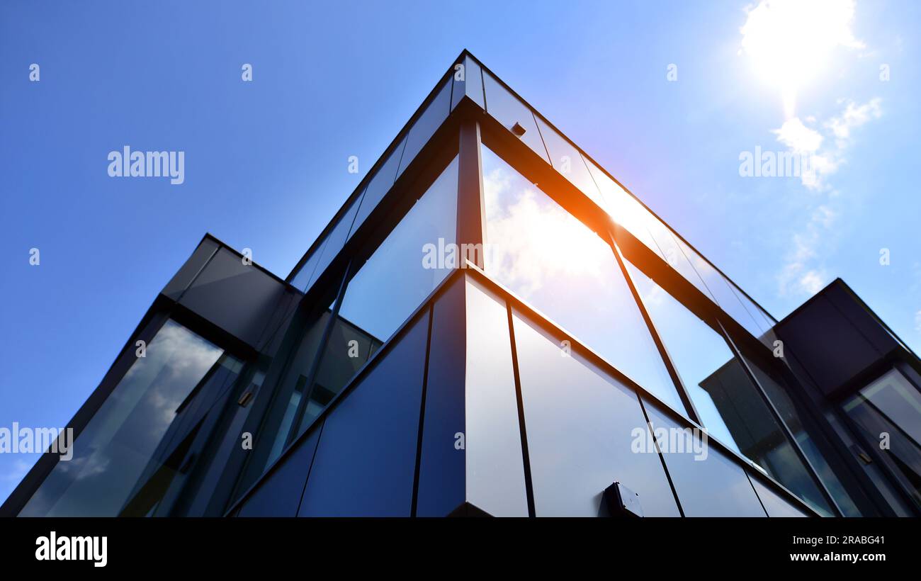Graphite facade and large windows on a fragment of an office building ...