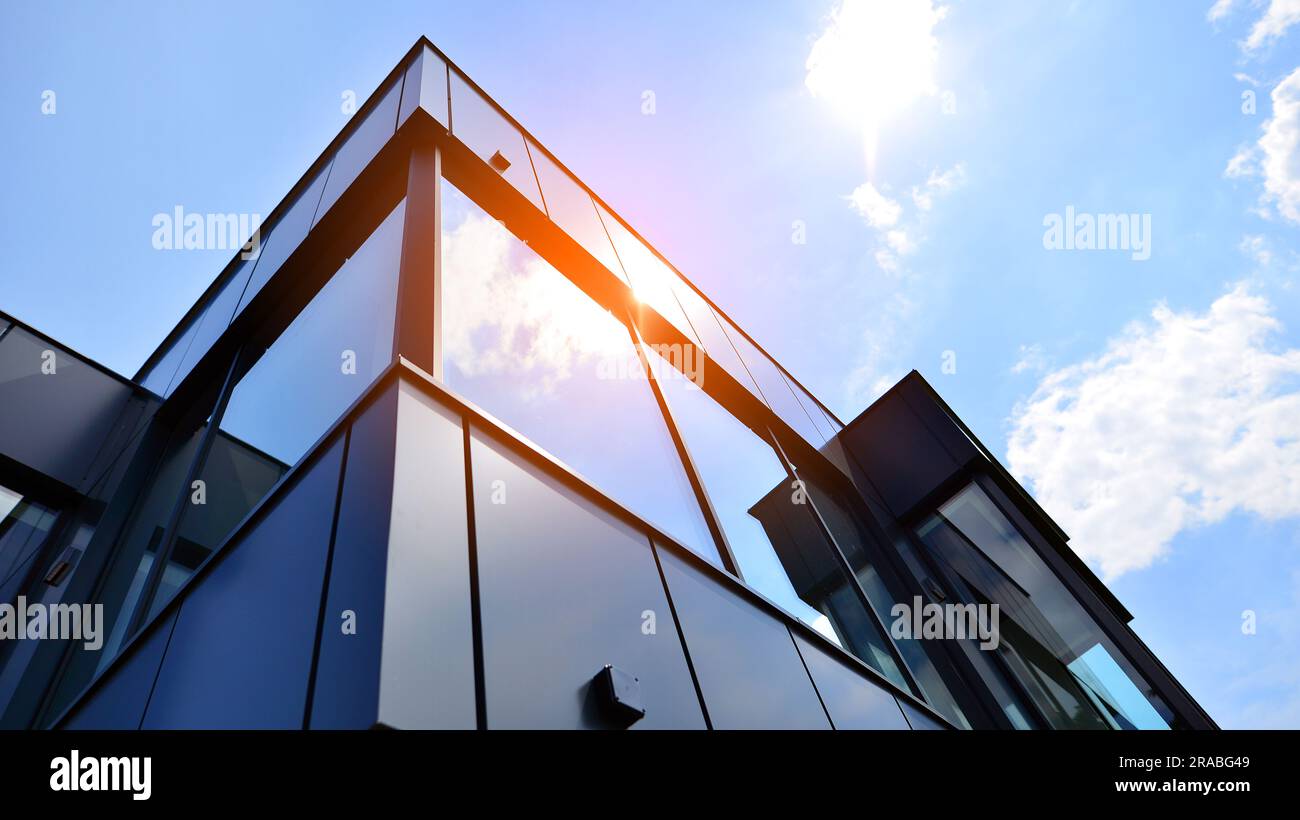 Graphite facade and large windows on a fragment of an office building ...