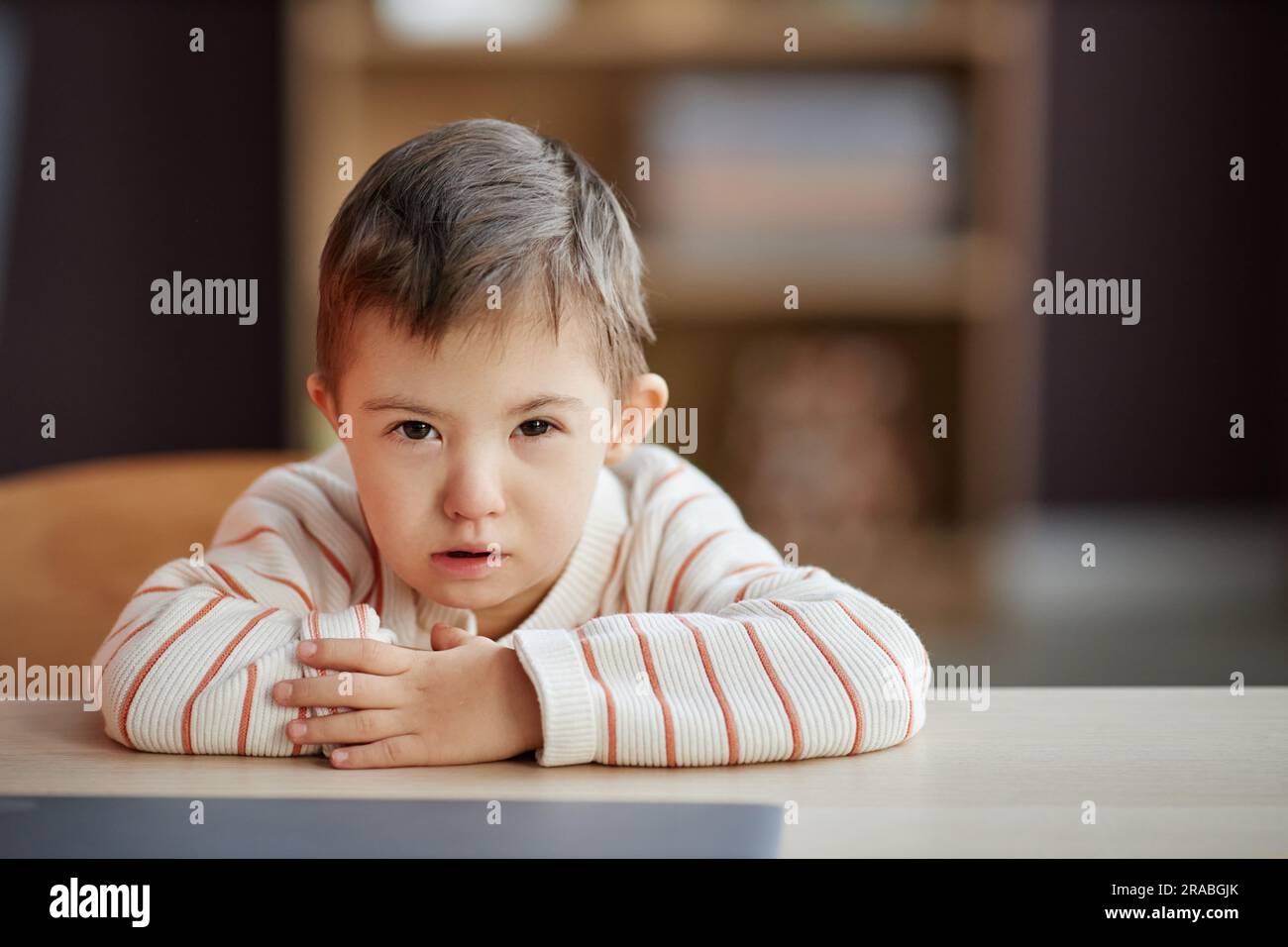 Boy with autism and down's syndrome hi-res stock photography and images ...