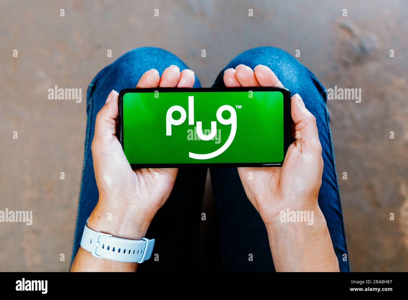 In this photo illustration, the Plug Power logo is displayed on a ...