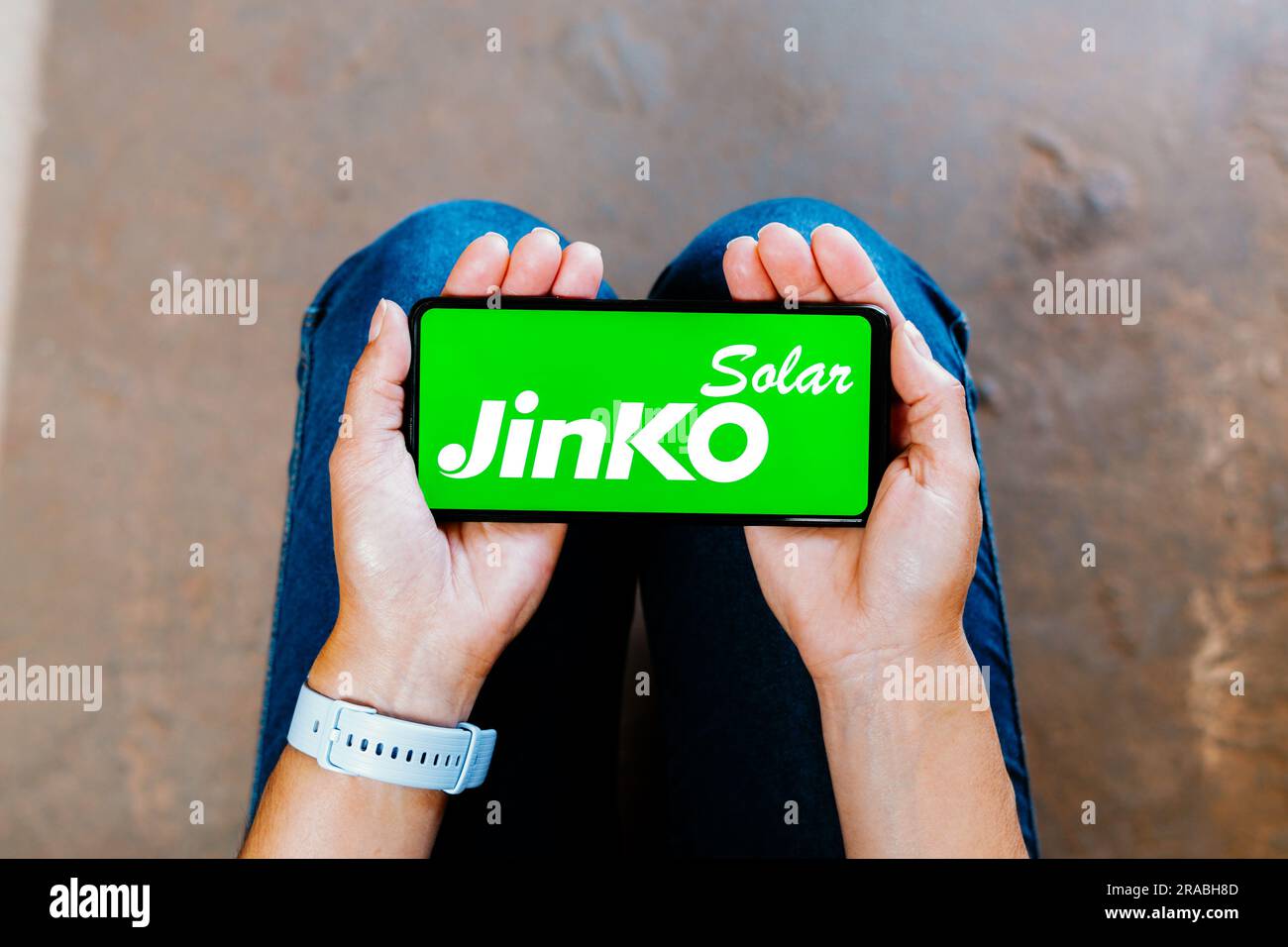 In this photo illustration, the Jinko Solar logo is displayed on a ...