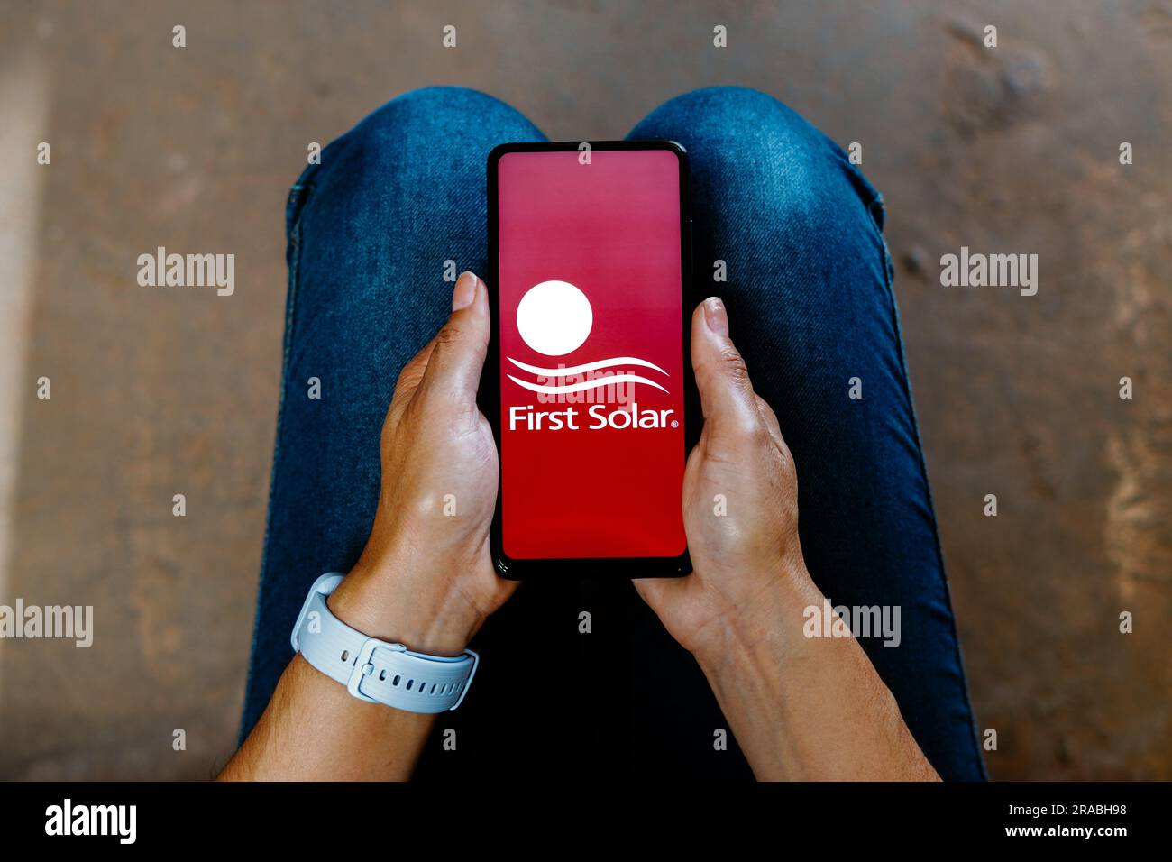 In this photo illustration, the First Solar logo is displayed on a ...