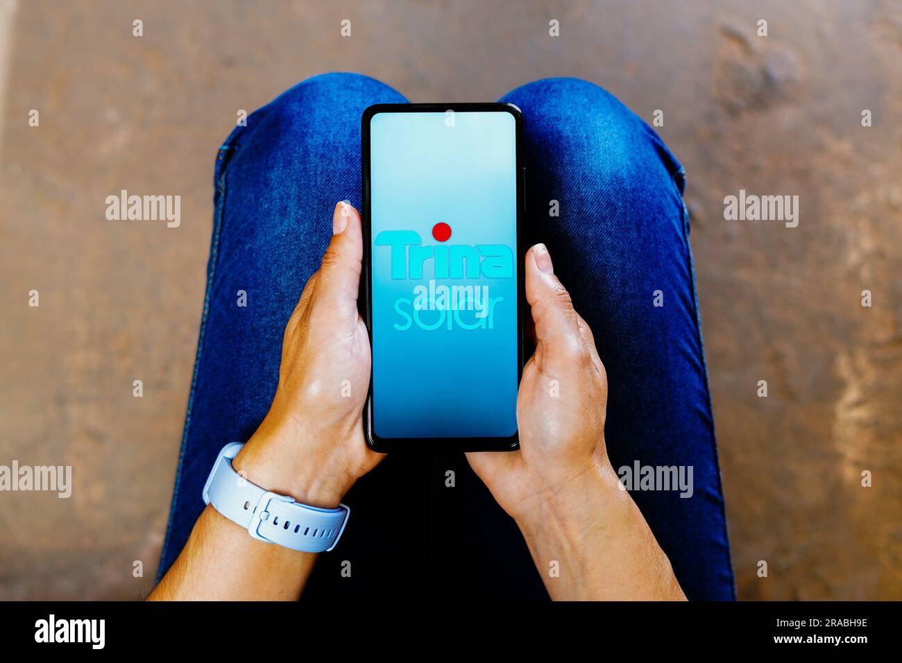 In this photo illustration, the Trina Solar logo is displayed on a ...