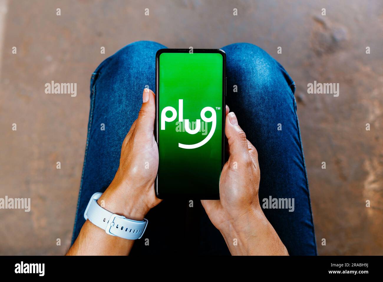In this photo illustration, the Plug Power logo is displayed on a ...