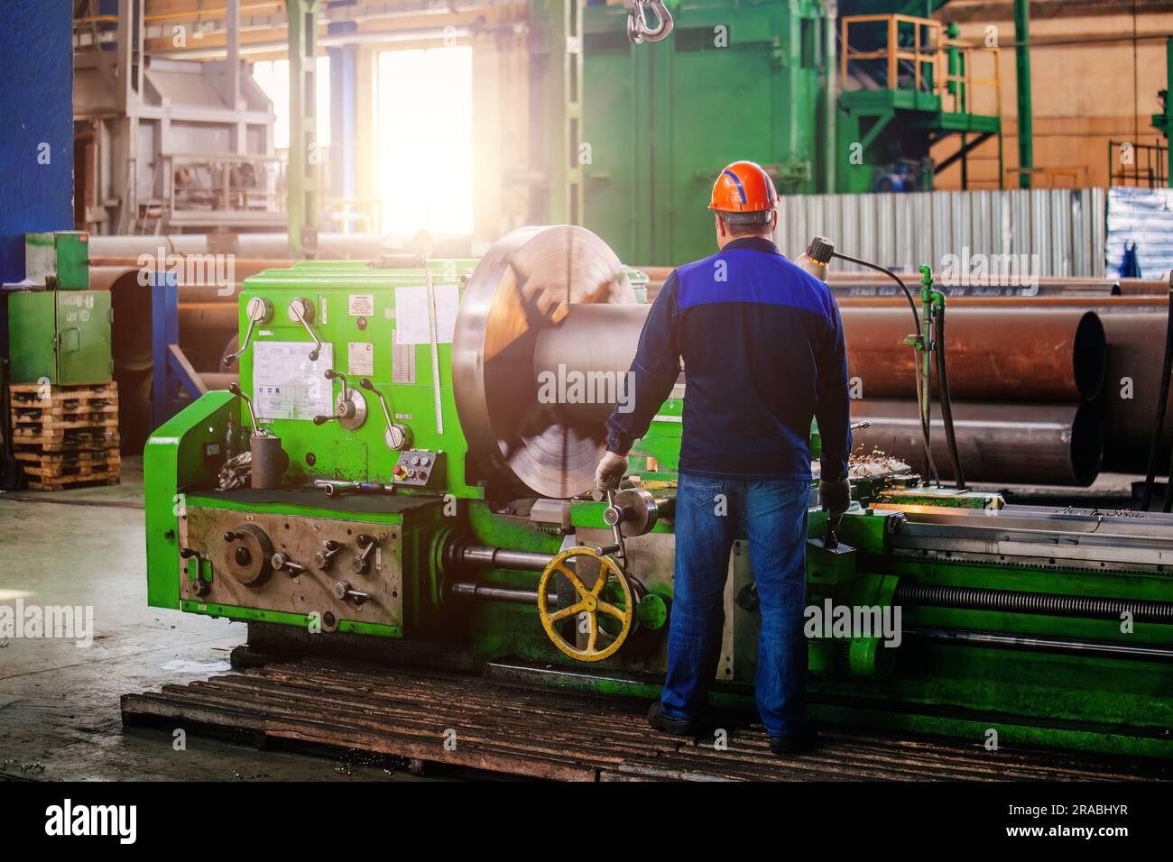 Mechanic working on lathe machine hi-res stock photography and images ...