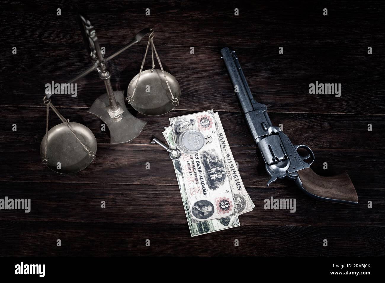Old west Colt revolver and US banknotes and silver certificates with ...