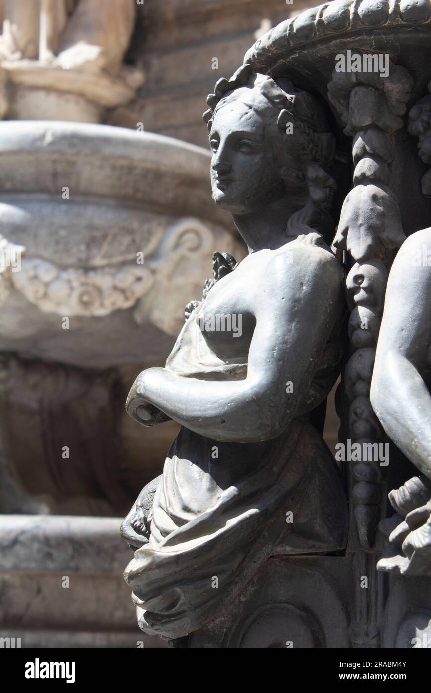 Decorative female figure on a lampost in Quattro Canti - Piazza ...