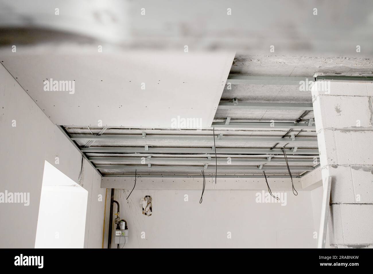 Structure with profiles and plasterboard for installation of suspended ...