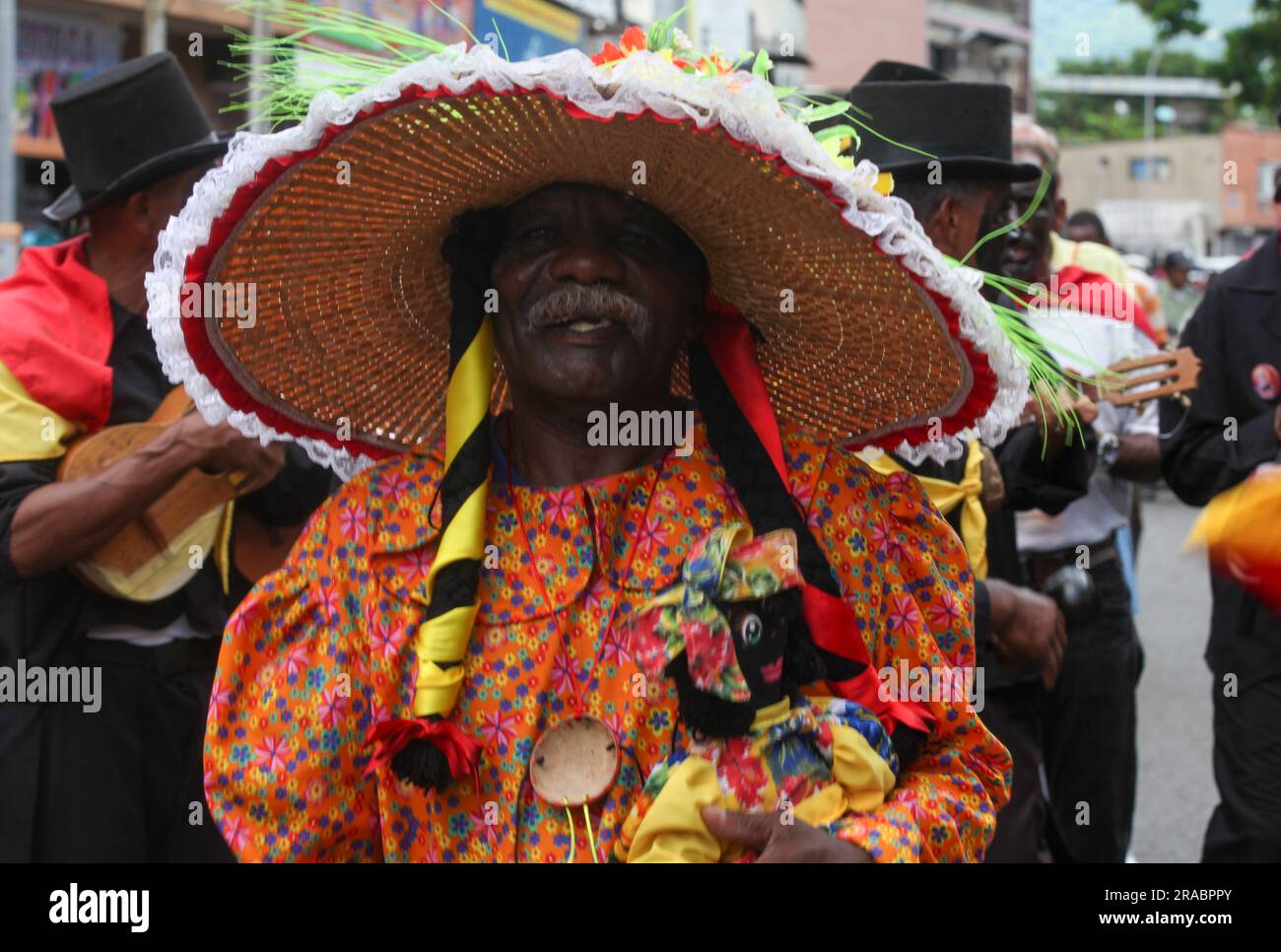 A man dressed as a woman, representing María Ignacia, the main character in the history of the ...