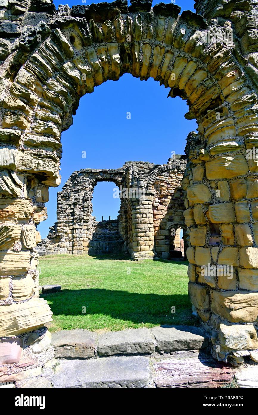 Tynemouth Priory ruinsl within the castle with a deep blue sky Stock ...
