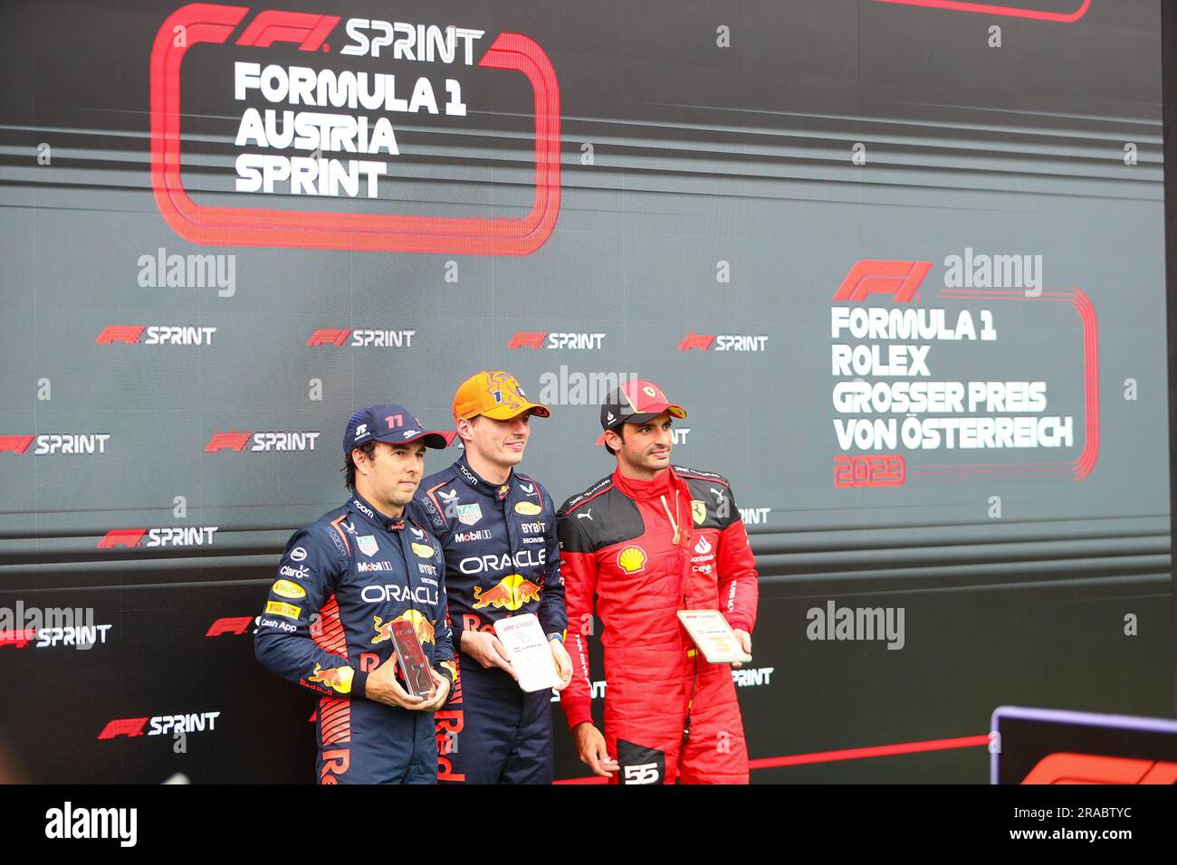 Sergio Perez (MEX) Redbull Racing RB19 Max Verstappen (NED) Redbull ...