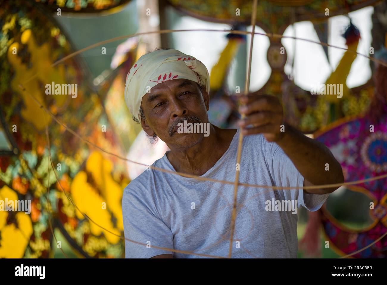 Terengganu tradisional kite or Wau maker Stock Photo - Alamy