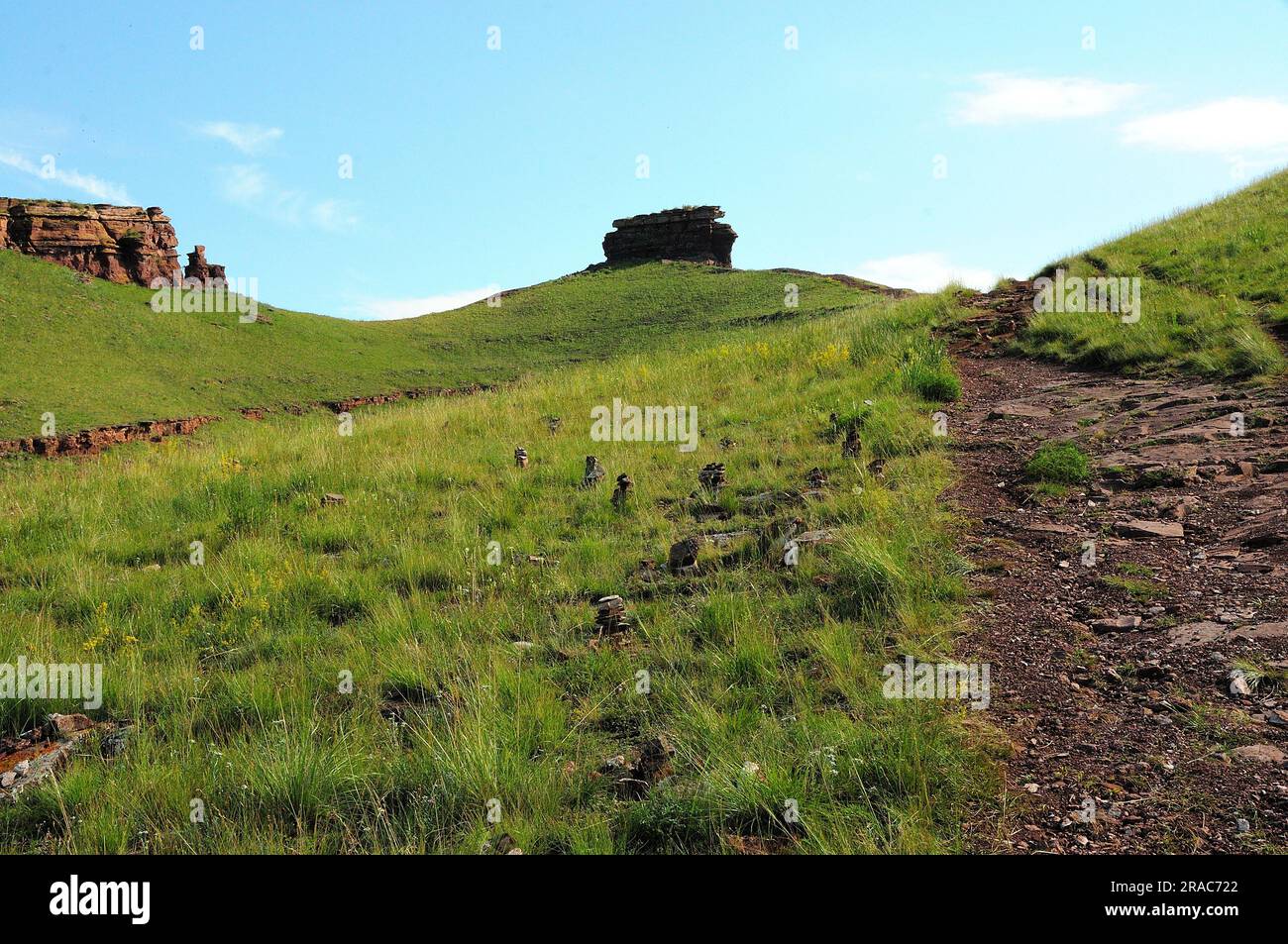 The path along the top of the hill to the stone formation in the center ...