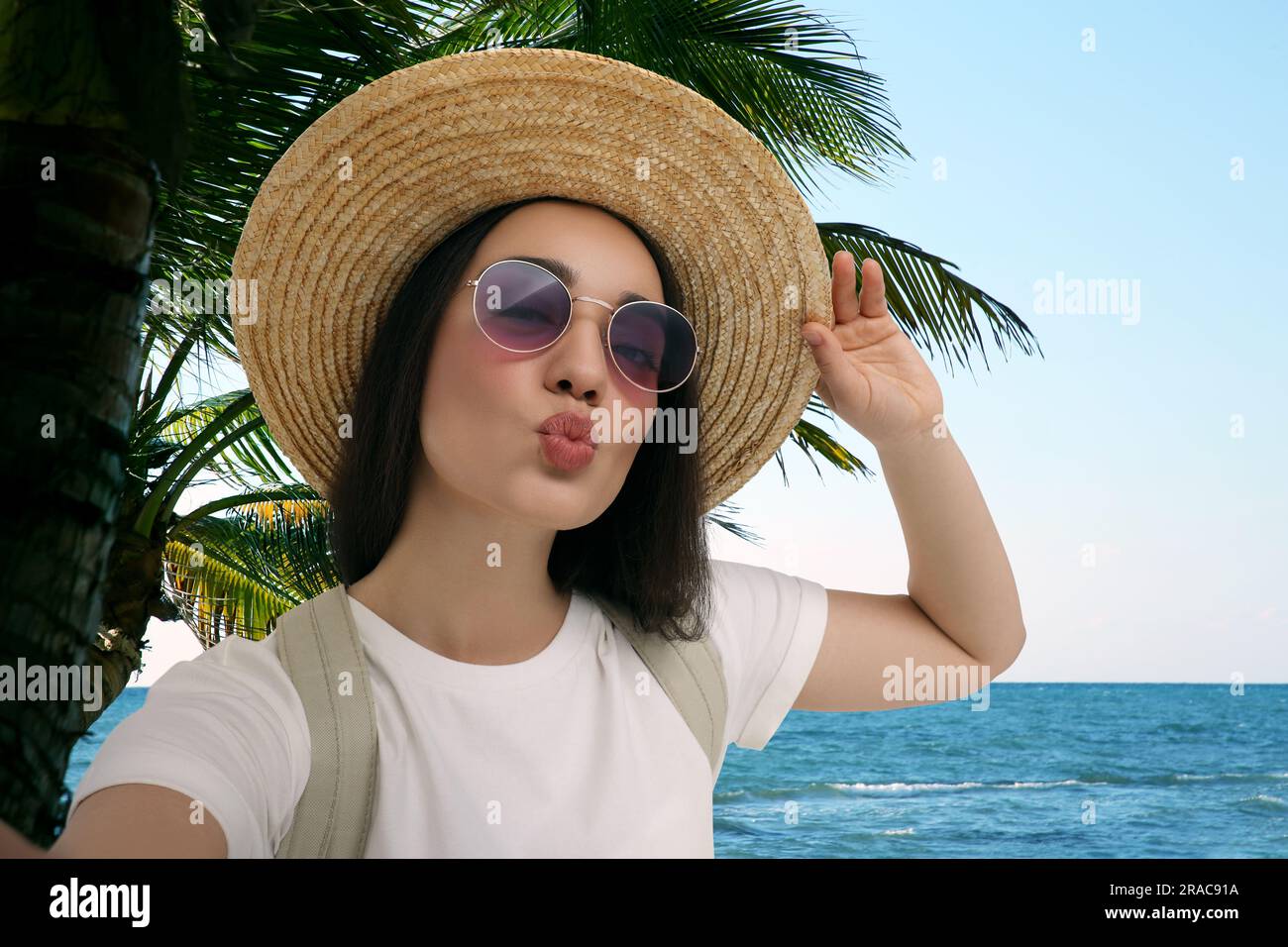 Beautiful woman in straw hi-res stock photography and images - Alamy