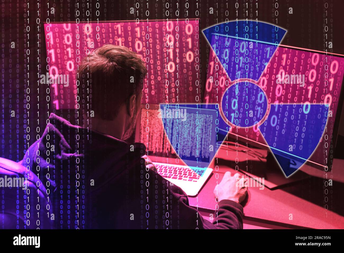 Nuclear deterrence. Hacker using computers, binary code and warning radiation symbol Stock Photo ...