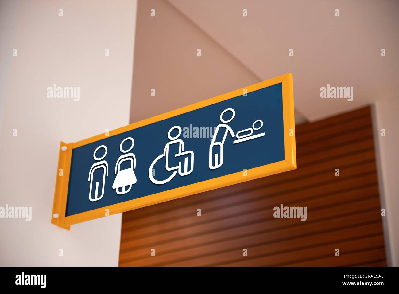 Blue public toilet sign on wall indoors Stock Photo - Alamy