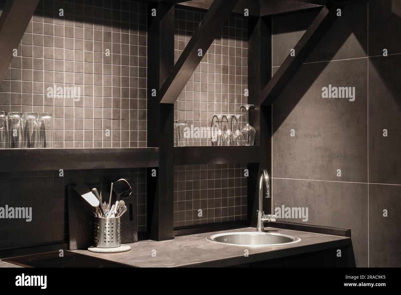 Stylish metal sink and utensils in hotel kitchen. Interior design Stock ...