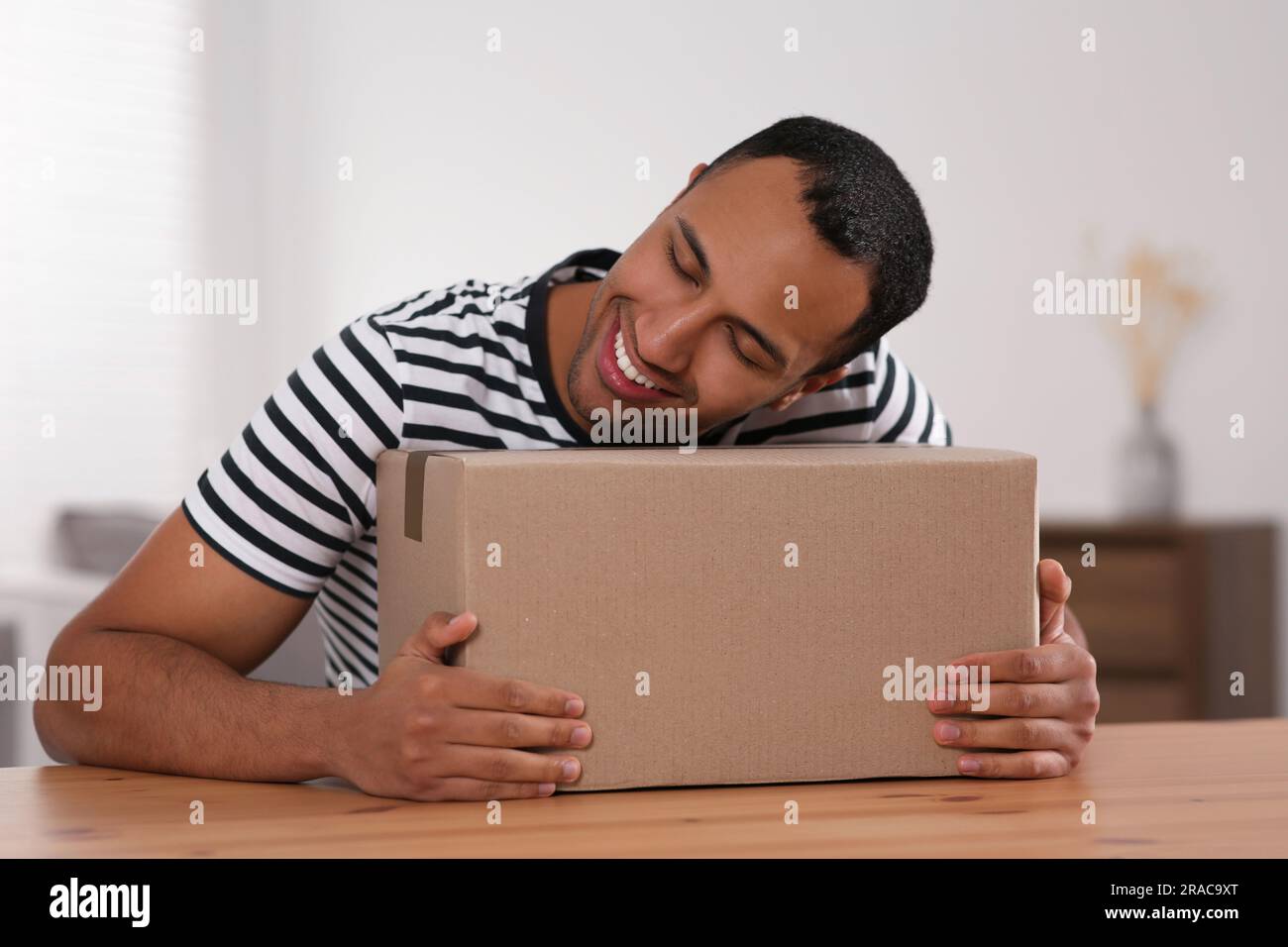 Happy man opening eyes smiling hi-res stock photography and images - Alamy