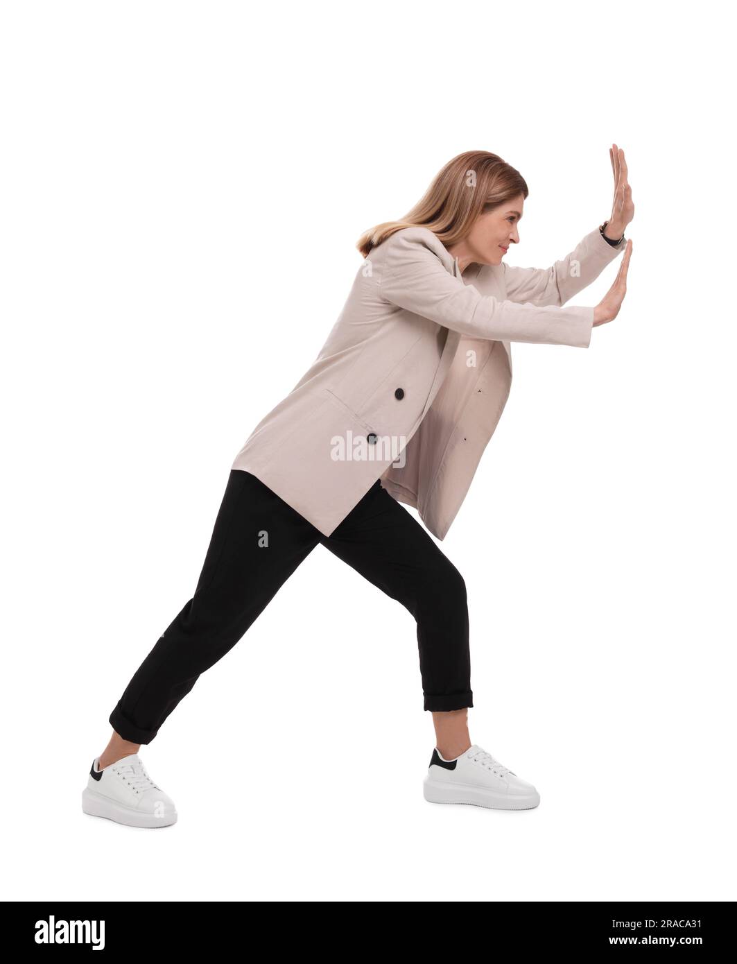 Attractive businesswoman pushing something hi-res stock photography and ...