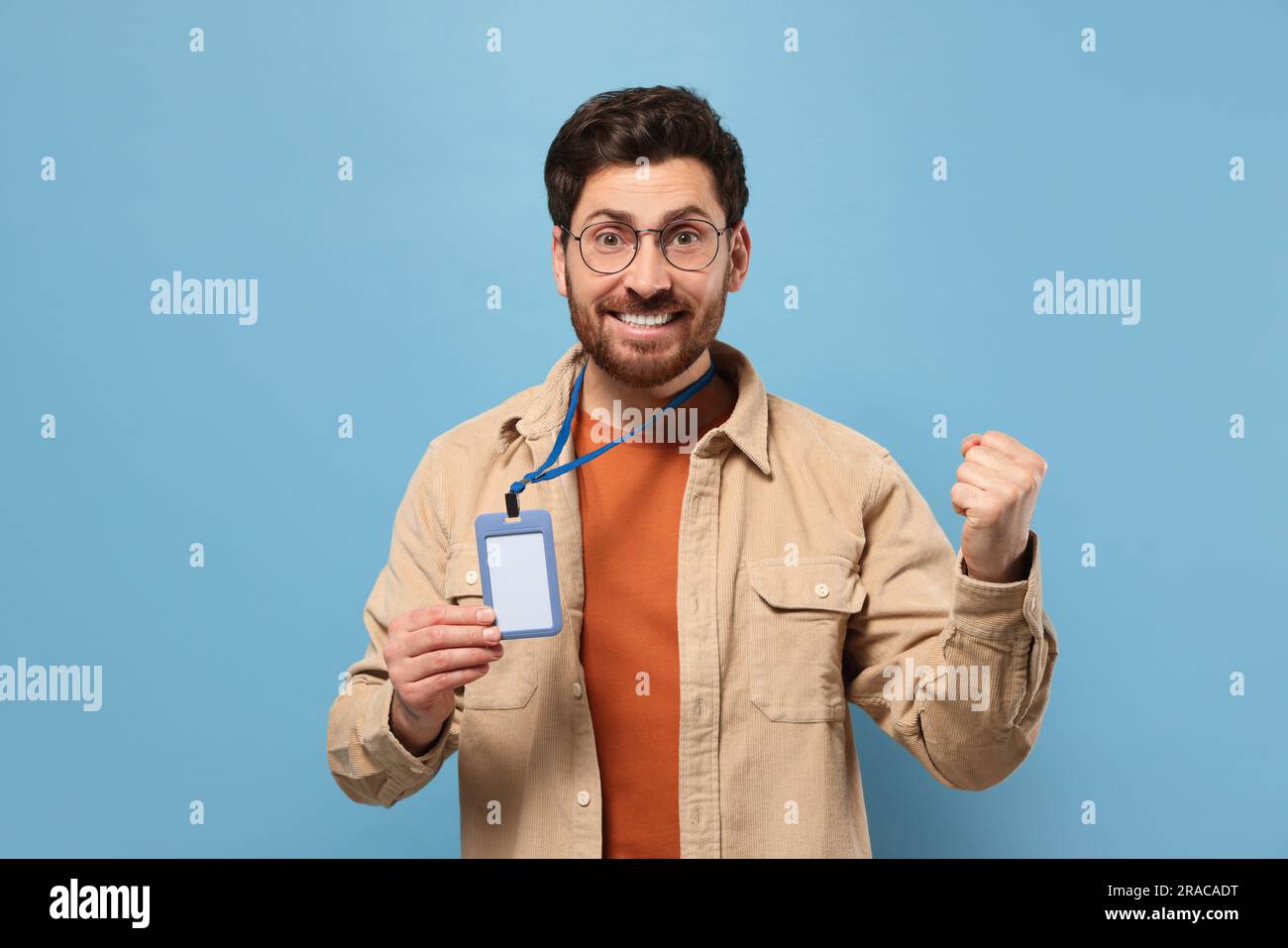 Happy man showing identity hi-res stock photography and images - Alamy