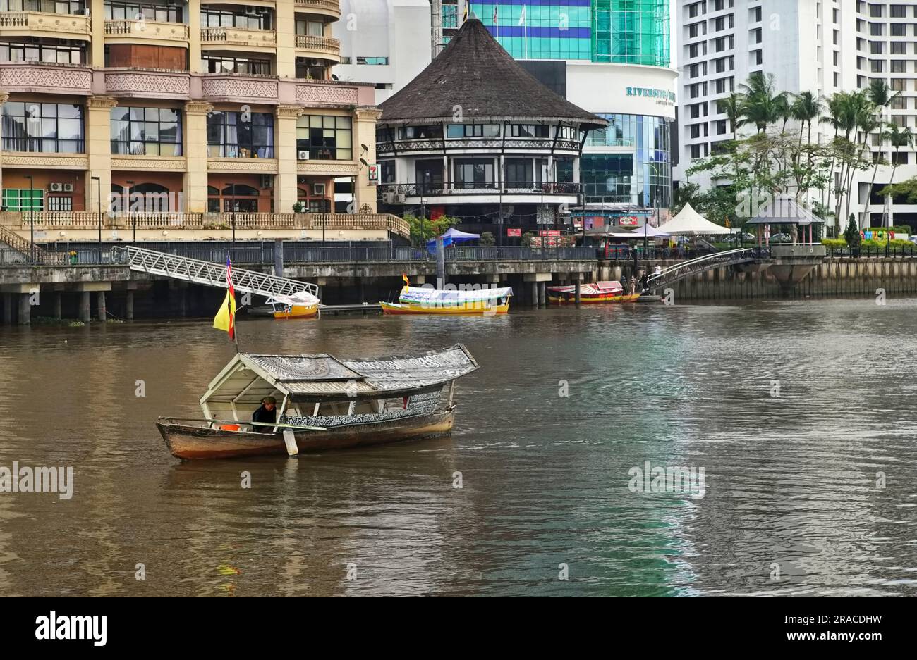 Water taxi crossing the Sarawak River, Kuching, Malaysia, Borneo Stock ...